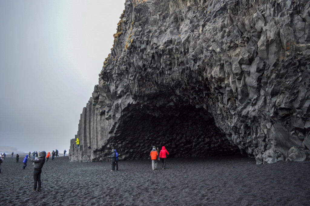 Standing On Reynisfjara Beach's Black Sand At Vik In Iceland | Ambition ...